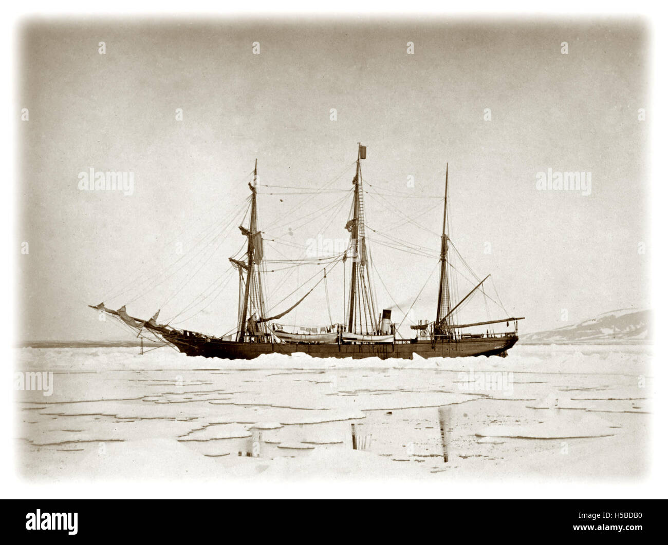 A photograph depicting a scene from polar exploration, likely showing ...
