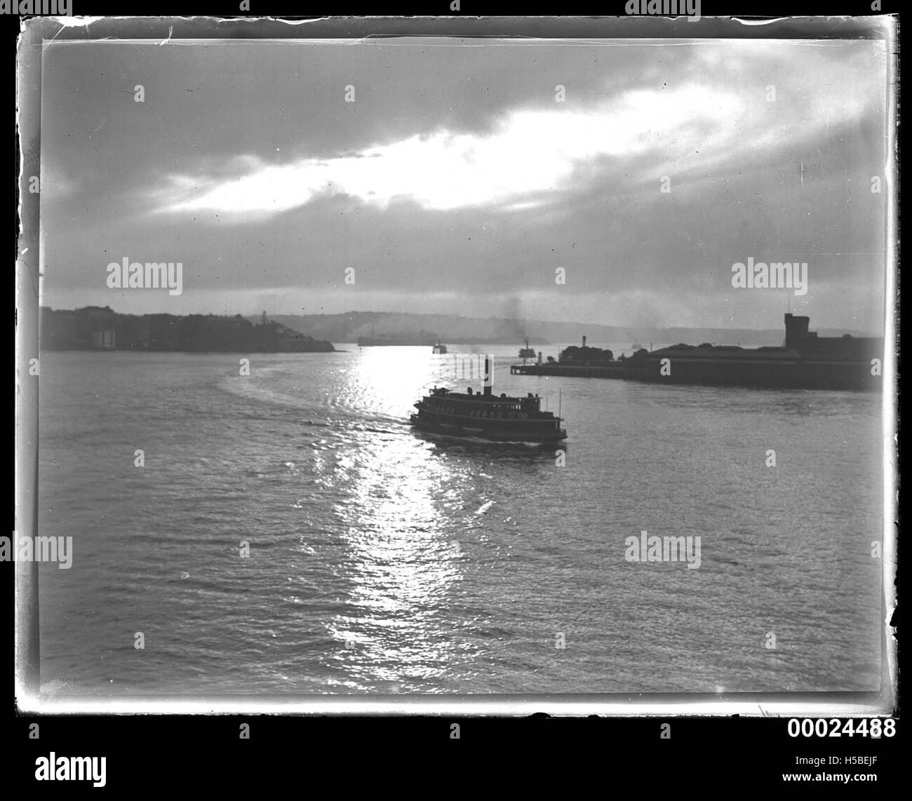 A Sydney Harbour steam ferry is approaching Circular Quay, likely ...