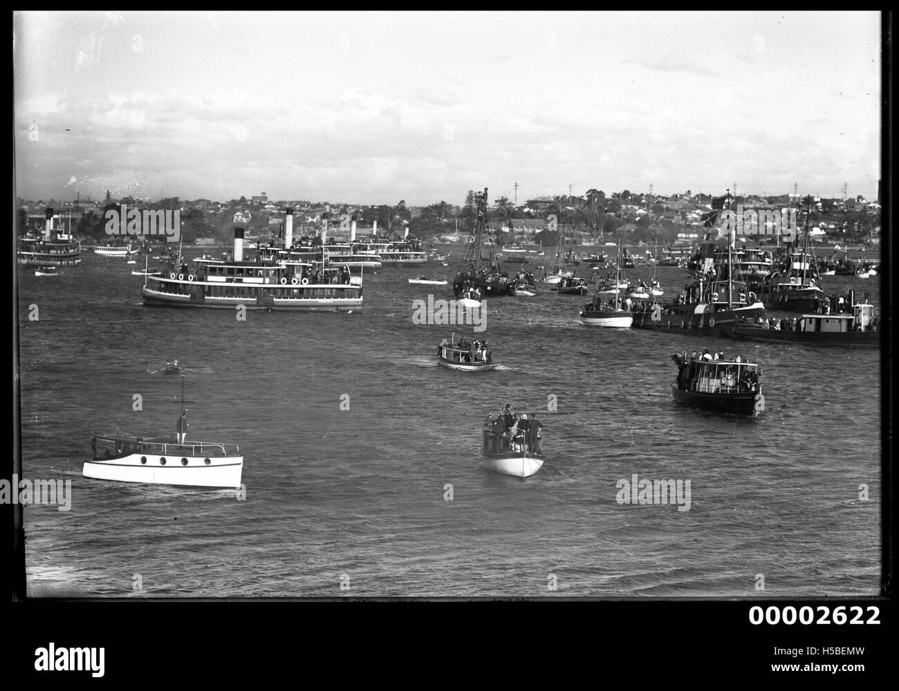 A scene showing competitors awaiting the finish of the 18-footer class ...