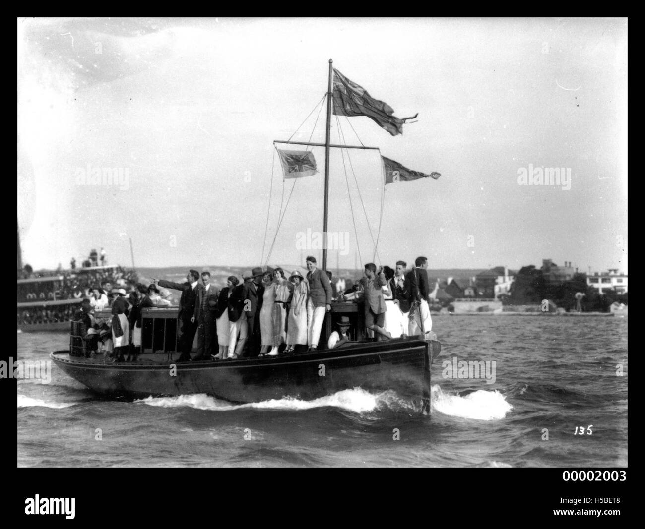 The launch of the ship AUSTRALIA is shown sailing on the harbor with ...
