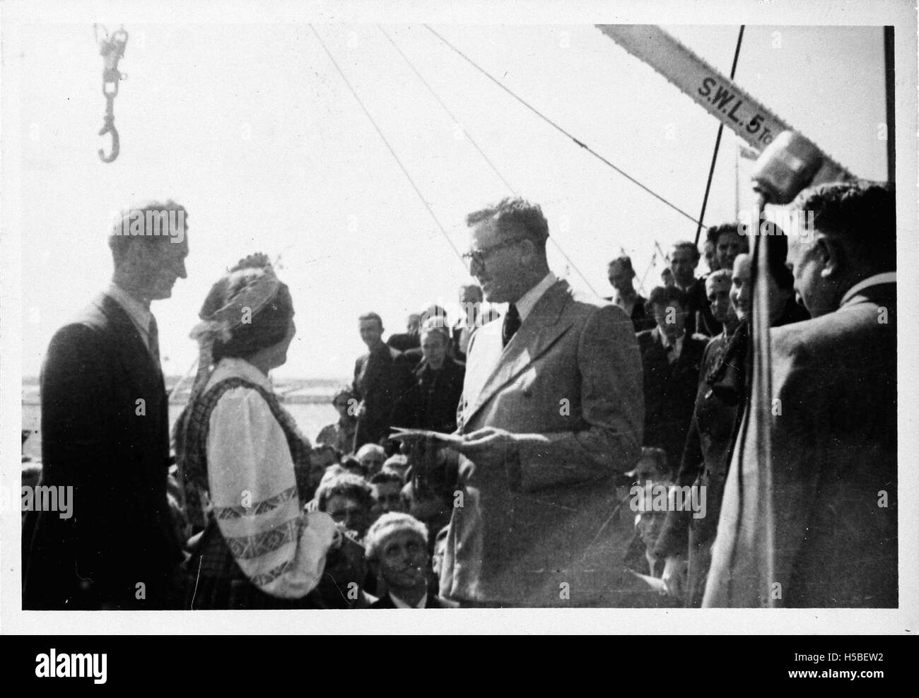 Immigrants aboard the KANIMBLA ship are seen with Immigration Minister ...