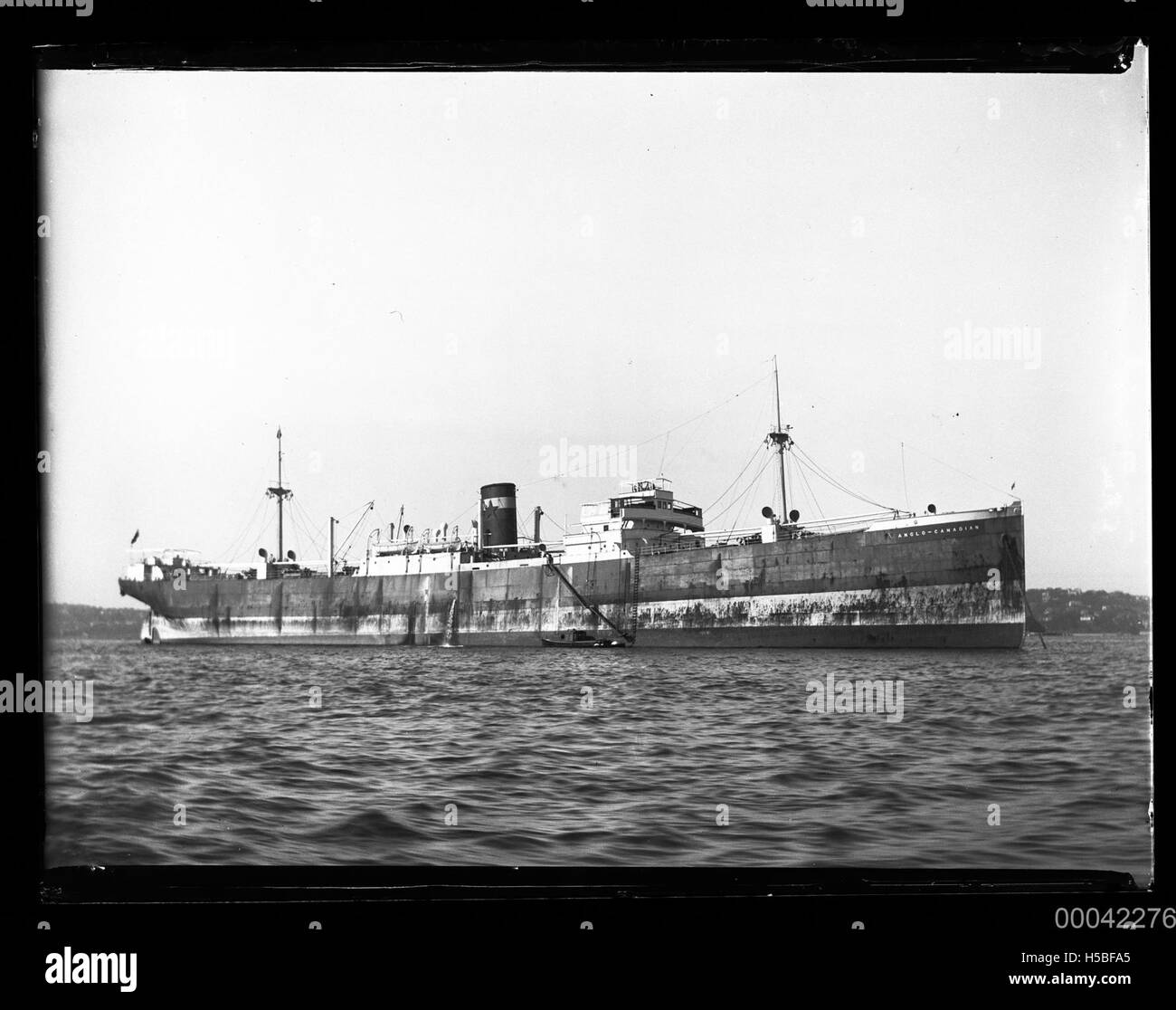 The cargo ship ANGLO-CANADIAN is anchored off Cremorne Point in Sydney ...