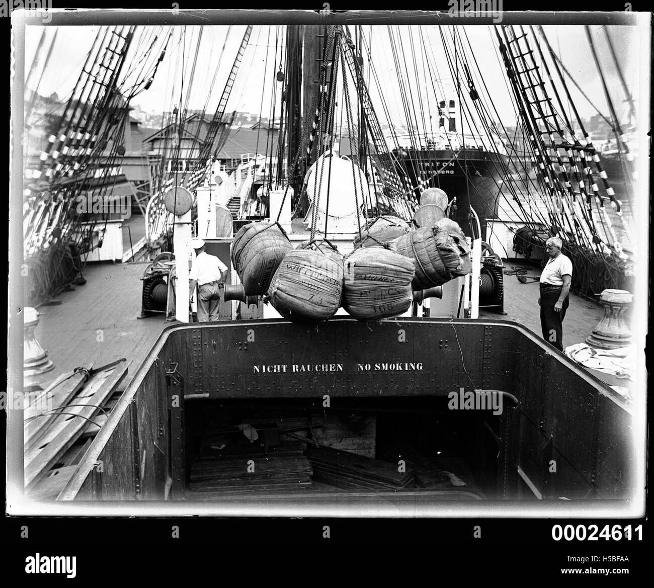 A photograph from March 1933 showing bales of wool being loaded into ...