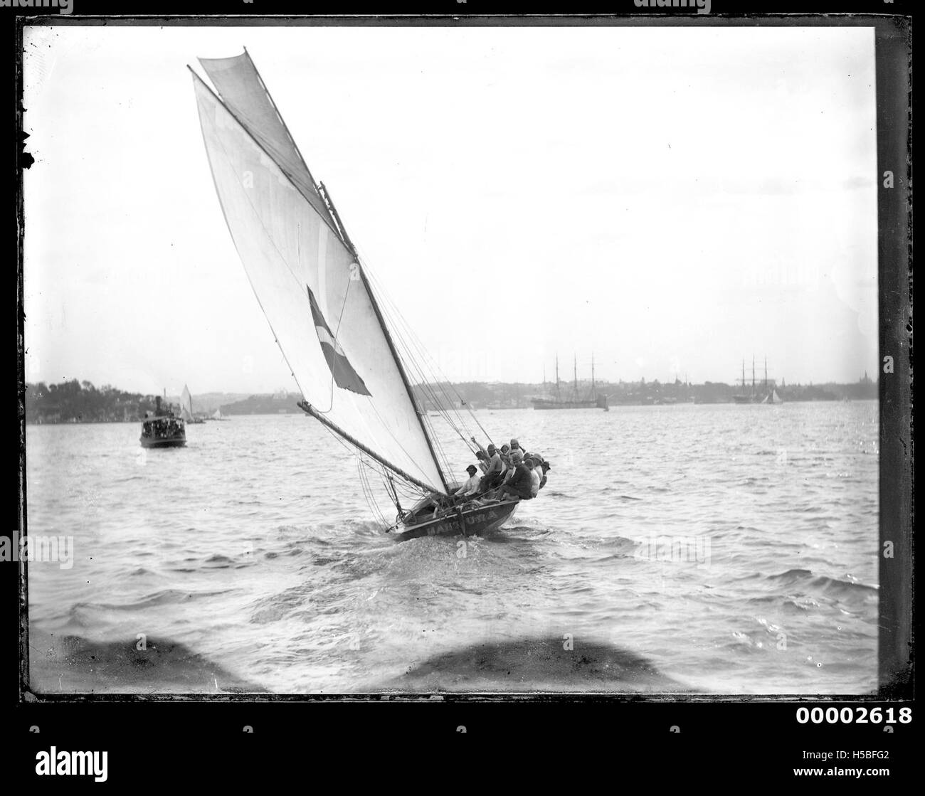 A photograph of the yacht MANTURA sailing on Sydney Harbour. This image ...