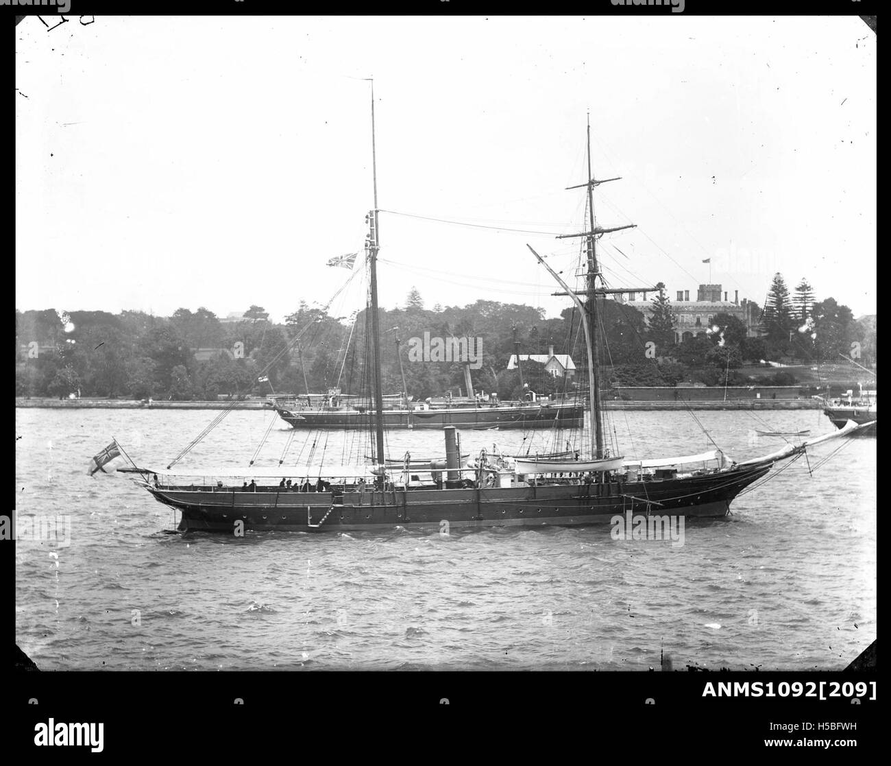 A schooner, potentially the HMS DART, is seen moored near Government ...