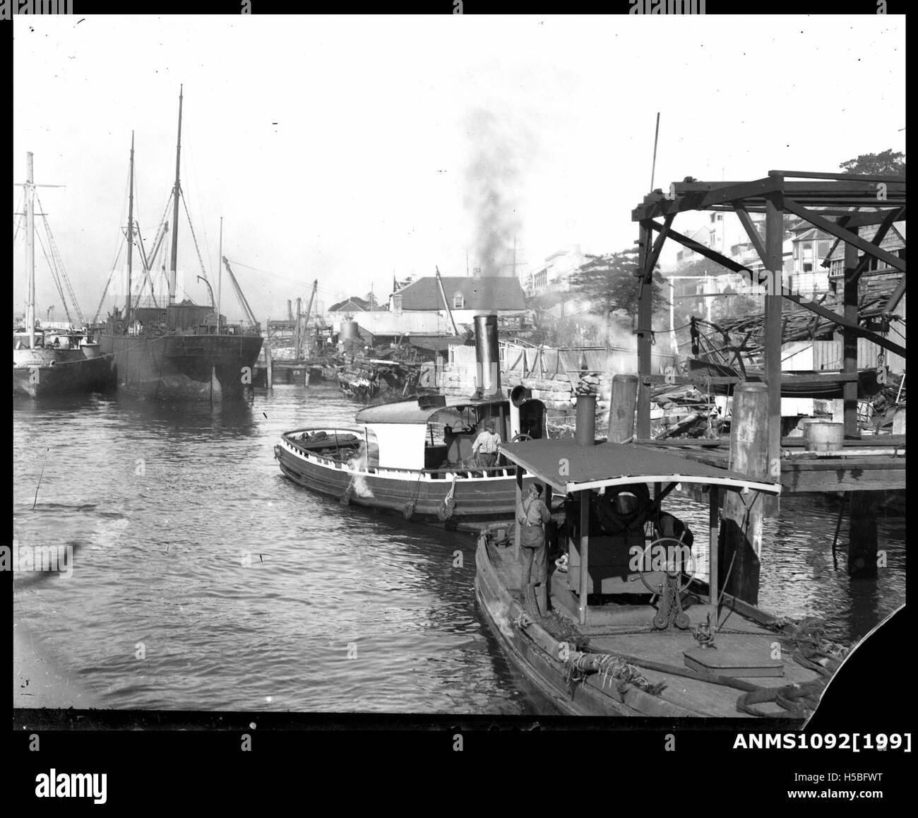 A historical photograph of a dockyard in Sydney Harbour, showcasing the ...