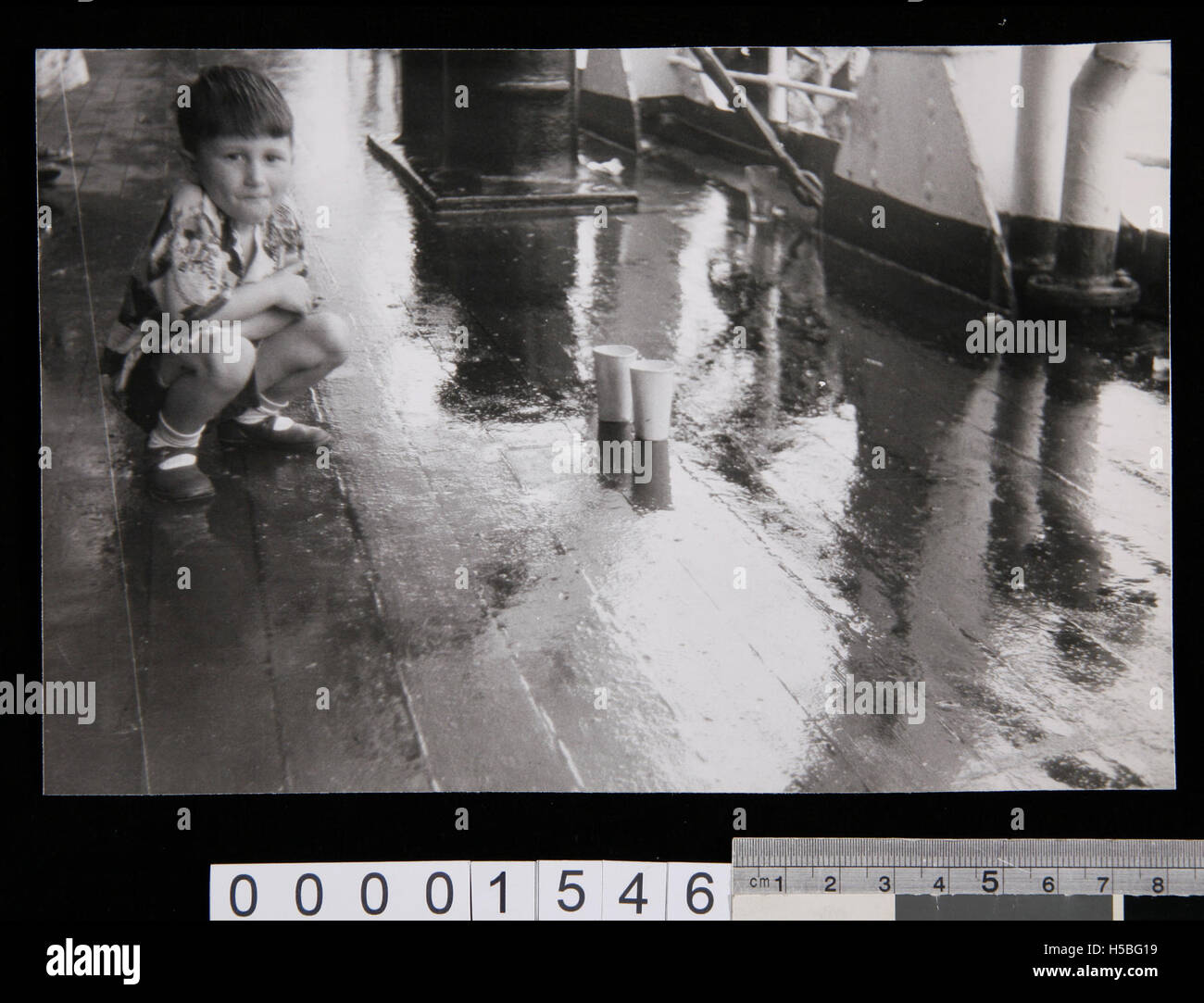 A photograph of people catching drips on the deck of the ship New ...
