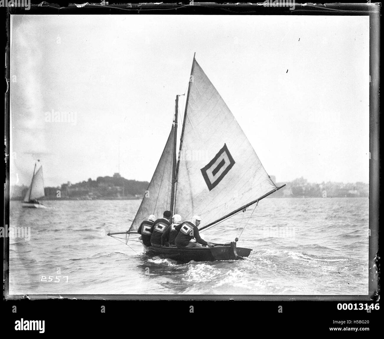 A 16-foot yacht, *Memory*, is shown sailing on Sydney Harbour ...