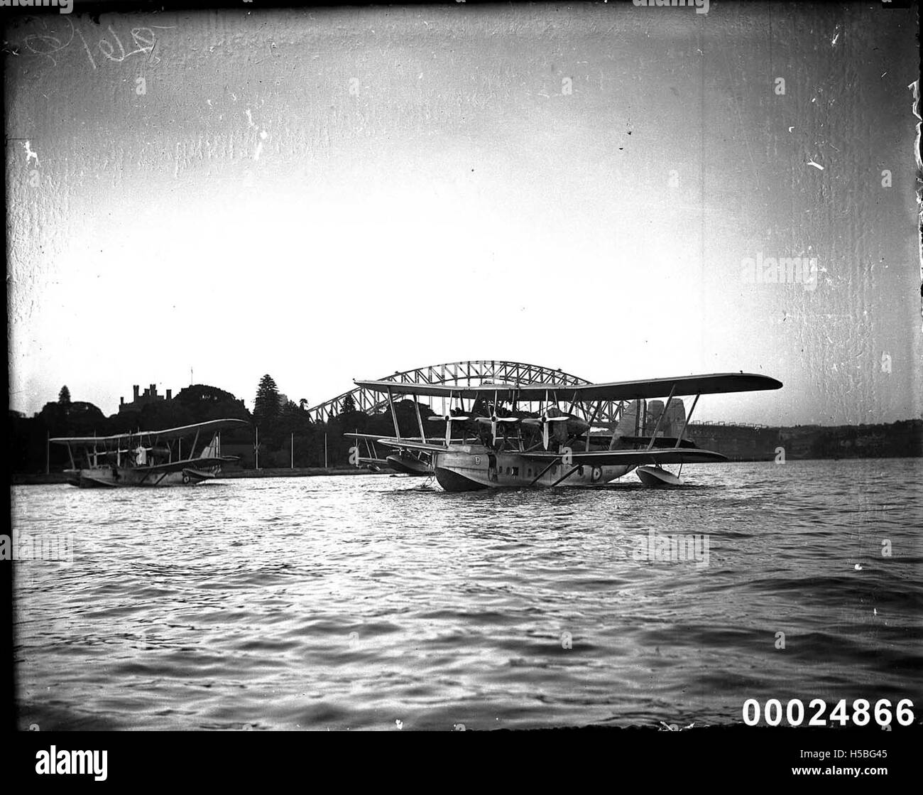 Three Short Rangoon flying boats are moored at Farm Cove in Sydney ...