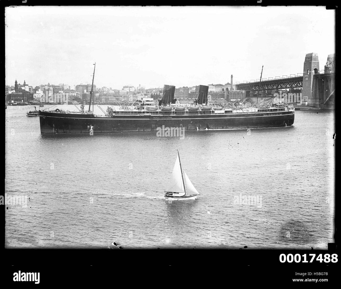 The passenger liner MOOLTAN is seen passing Dawes Point, a significant ...