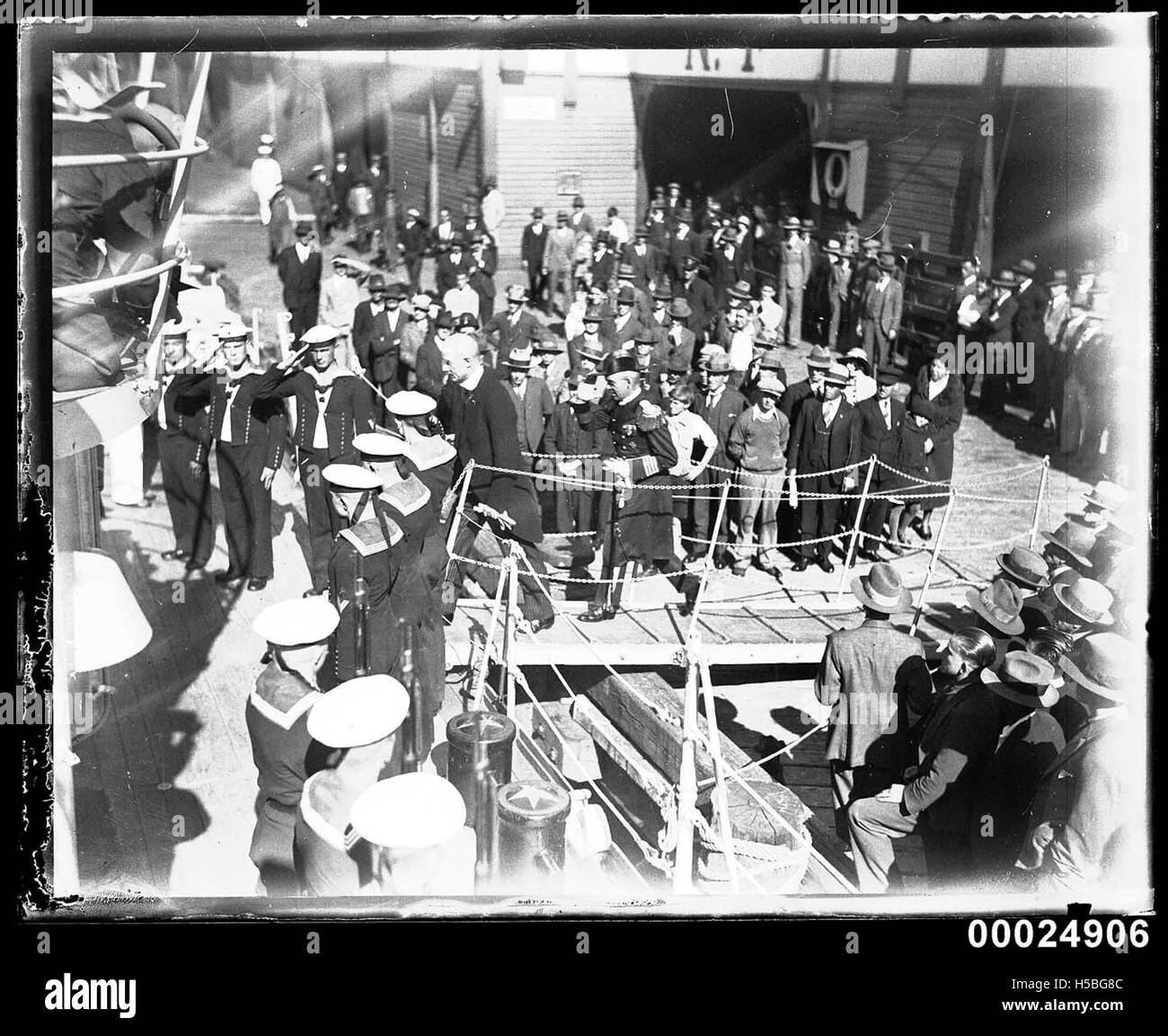 Dr. Rudolf Asmis and Captain Otto Schniewind are shown boarding the ...