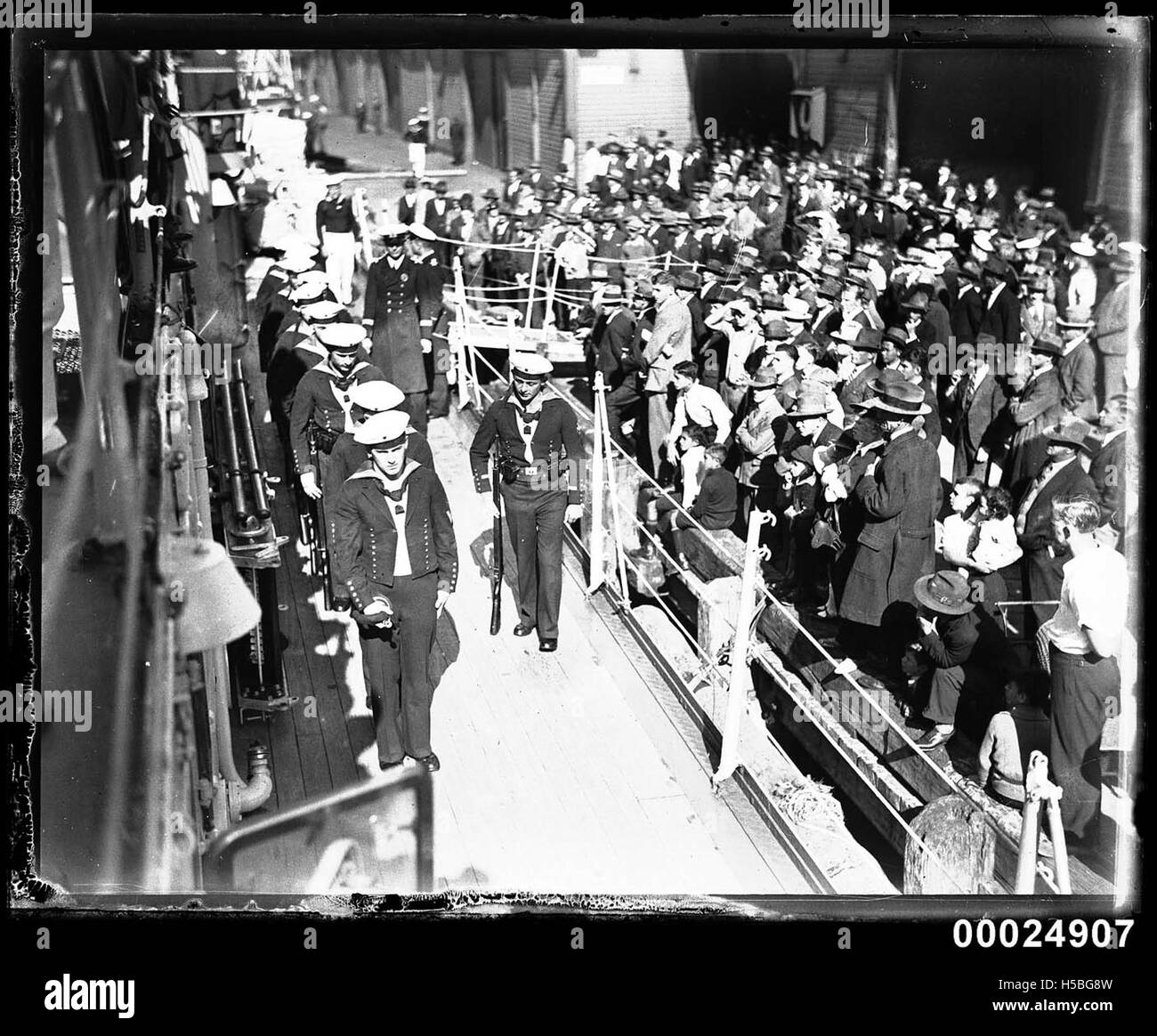 This image shows German crew members and officers on board the German ...