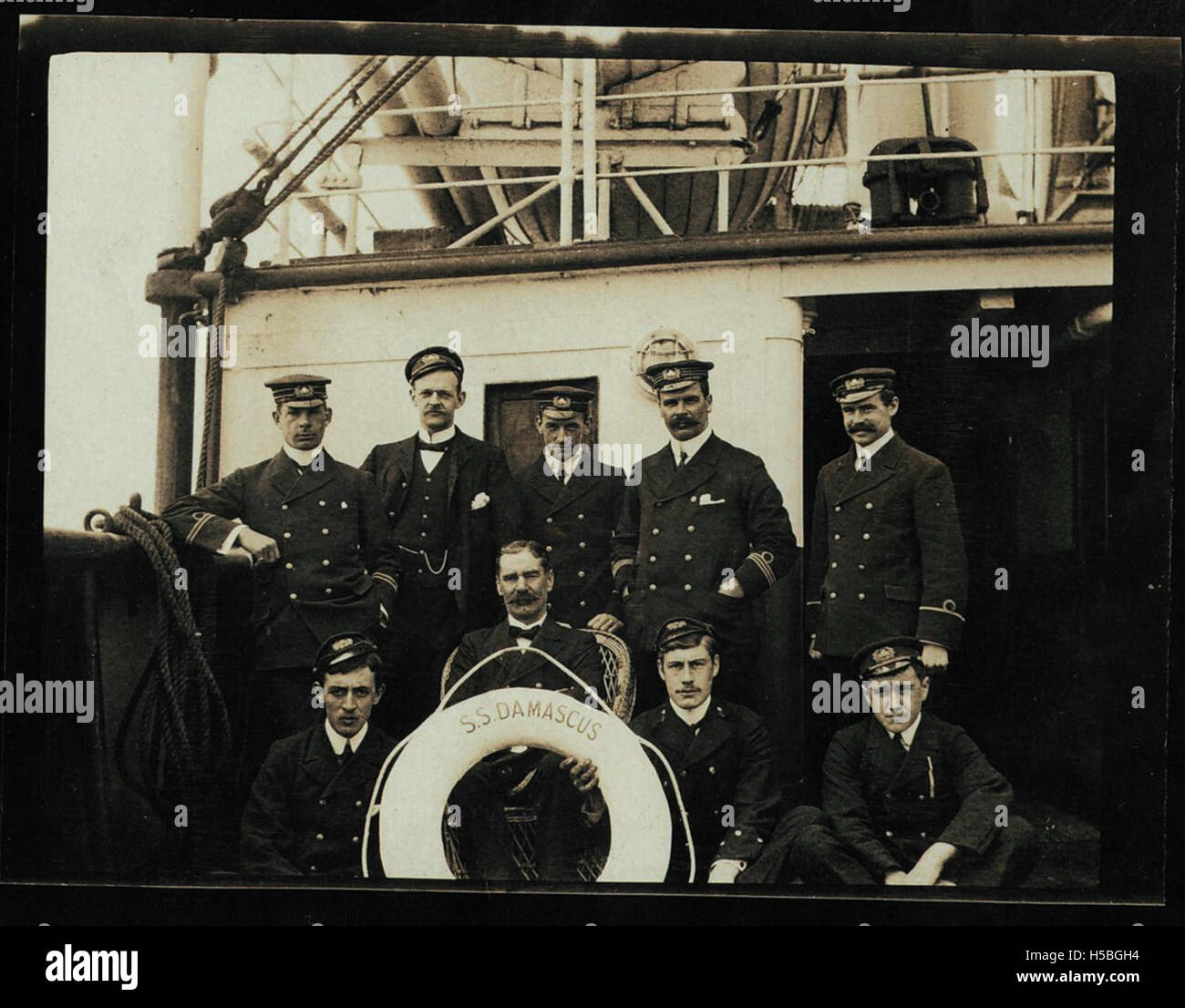 A group of officers pictured on the deck of the SS DAMASCUS, a ...