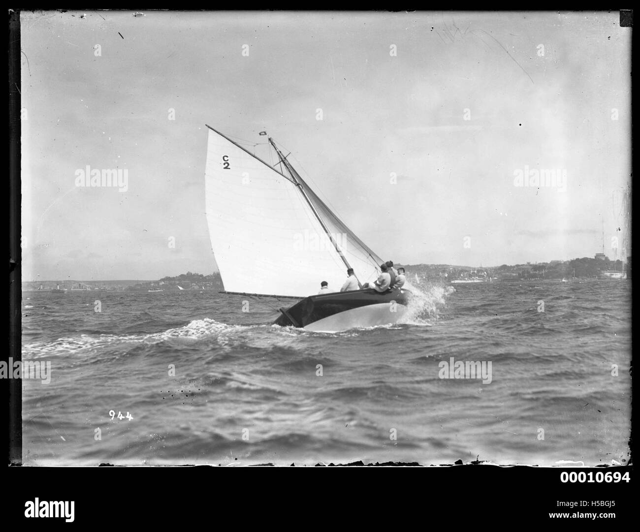The sloop E.O.J., owned by J. Milson, is shown navigating the waters of ...