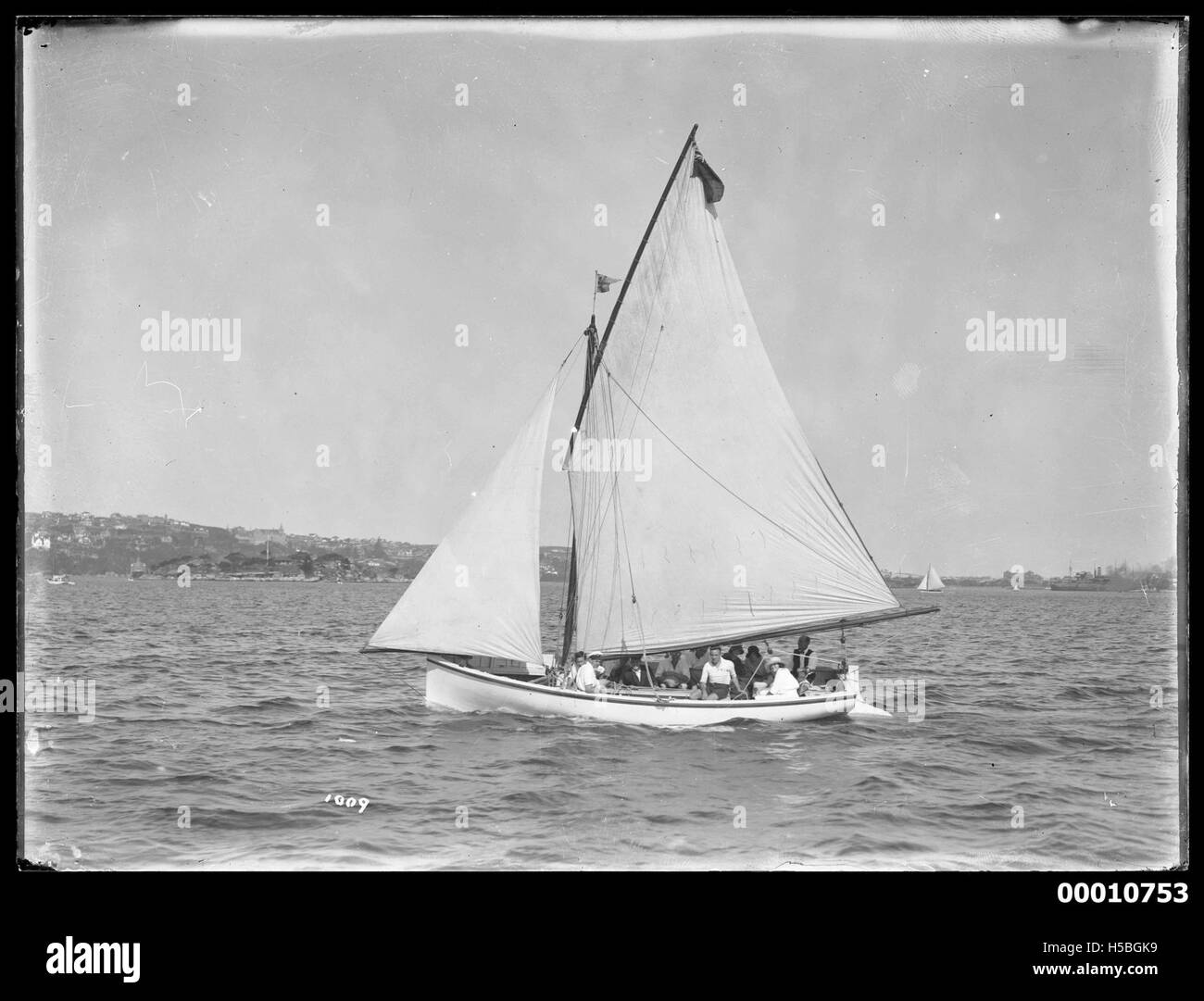A sloop, a type of sailing boat, is pictured on Sydney Harbour, known ...