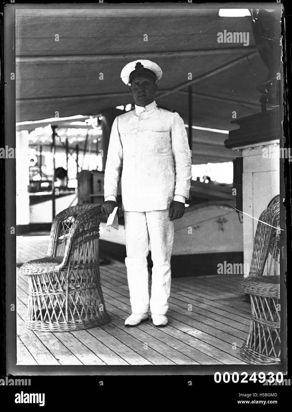 An officer aboard the Spanish Navy training ship JUAN SEBASTIAN DE ...