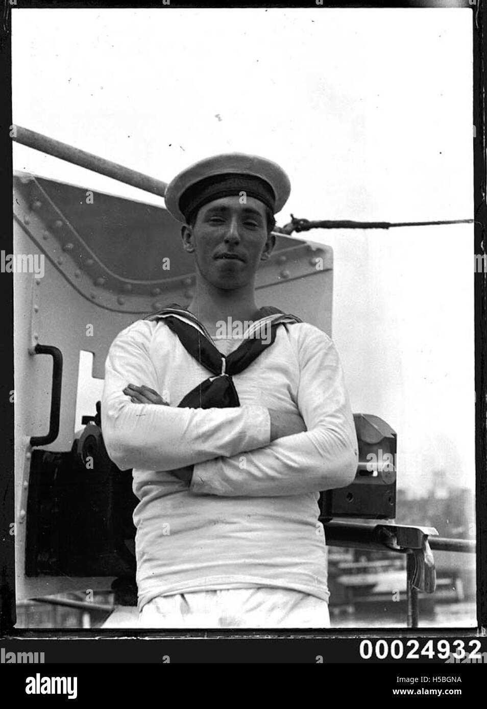 A sailor aboard the Spanish Navy training ship Juan Sebastian de Elcano ...