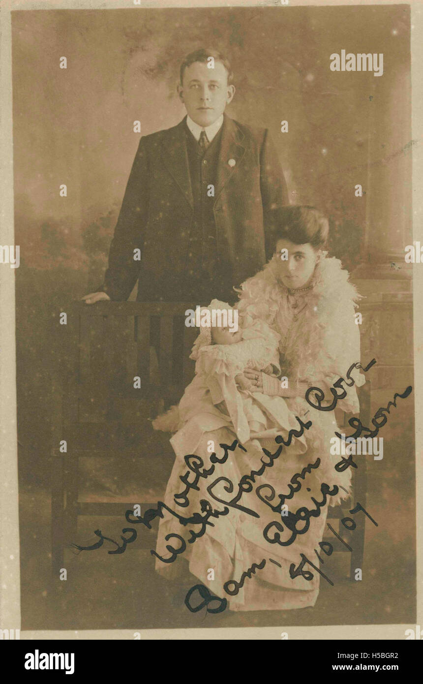 A photographic postcard depicts Samuel and Elsie Wild with their son ...