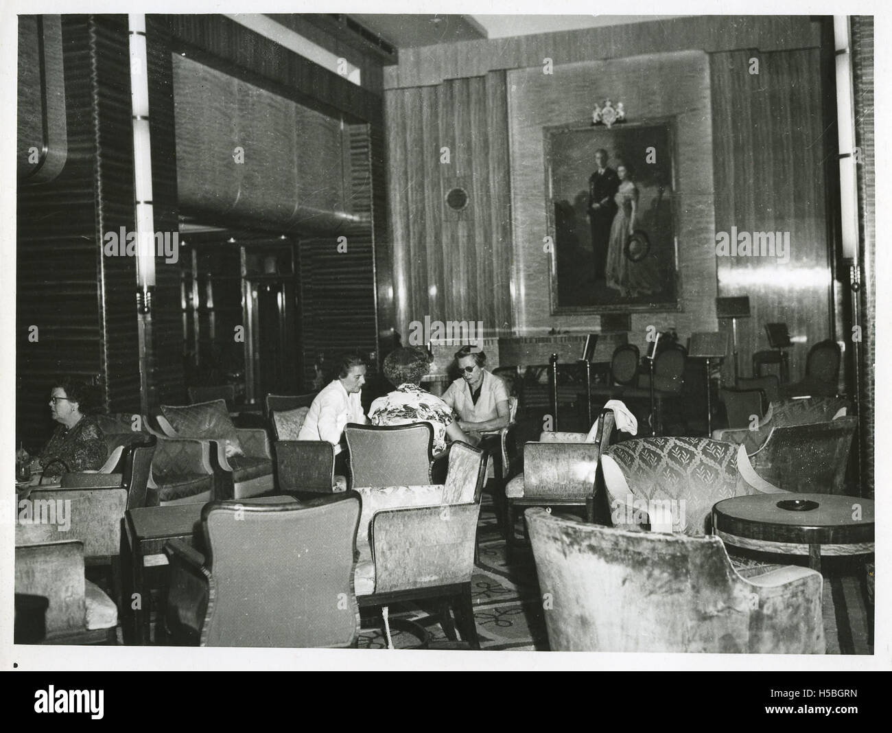 The lounge room onboard the RMS Caronia, an ocean liner, is depicted ...