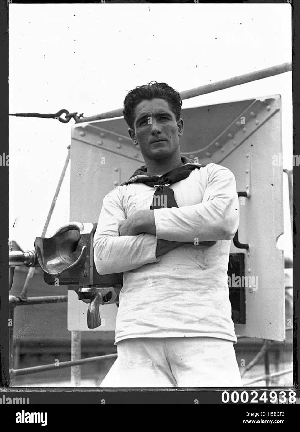 A sailor stands on board the Spanish Navy training ship Juan Sebastian ...