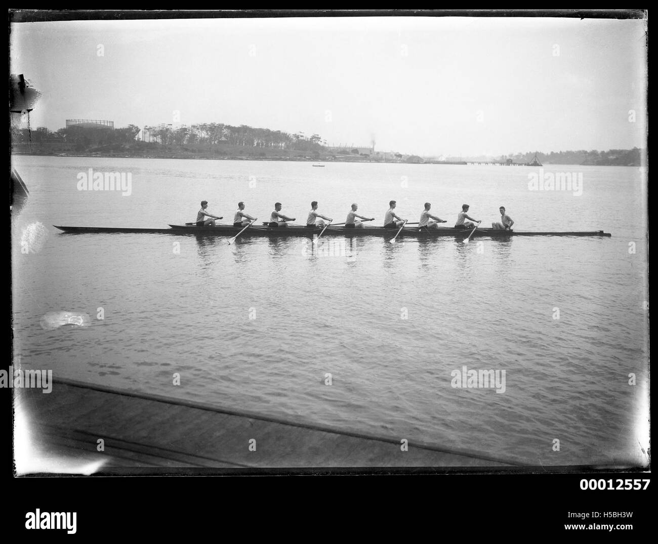 An eights rowing team is seen competing on Sydney Harbour. The image ...