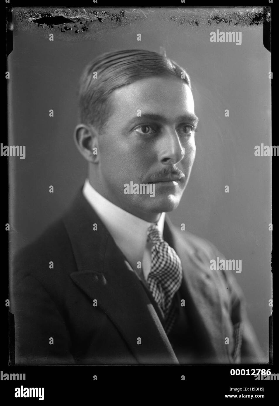 A portrait of an unidentified man, captured in a formal or informal ...