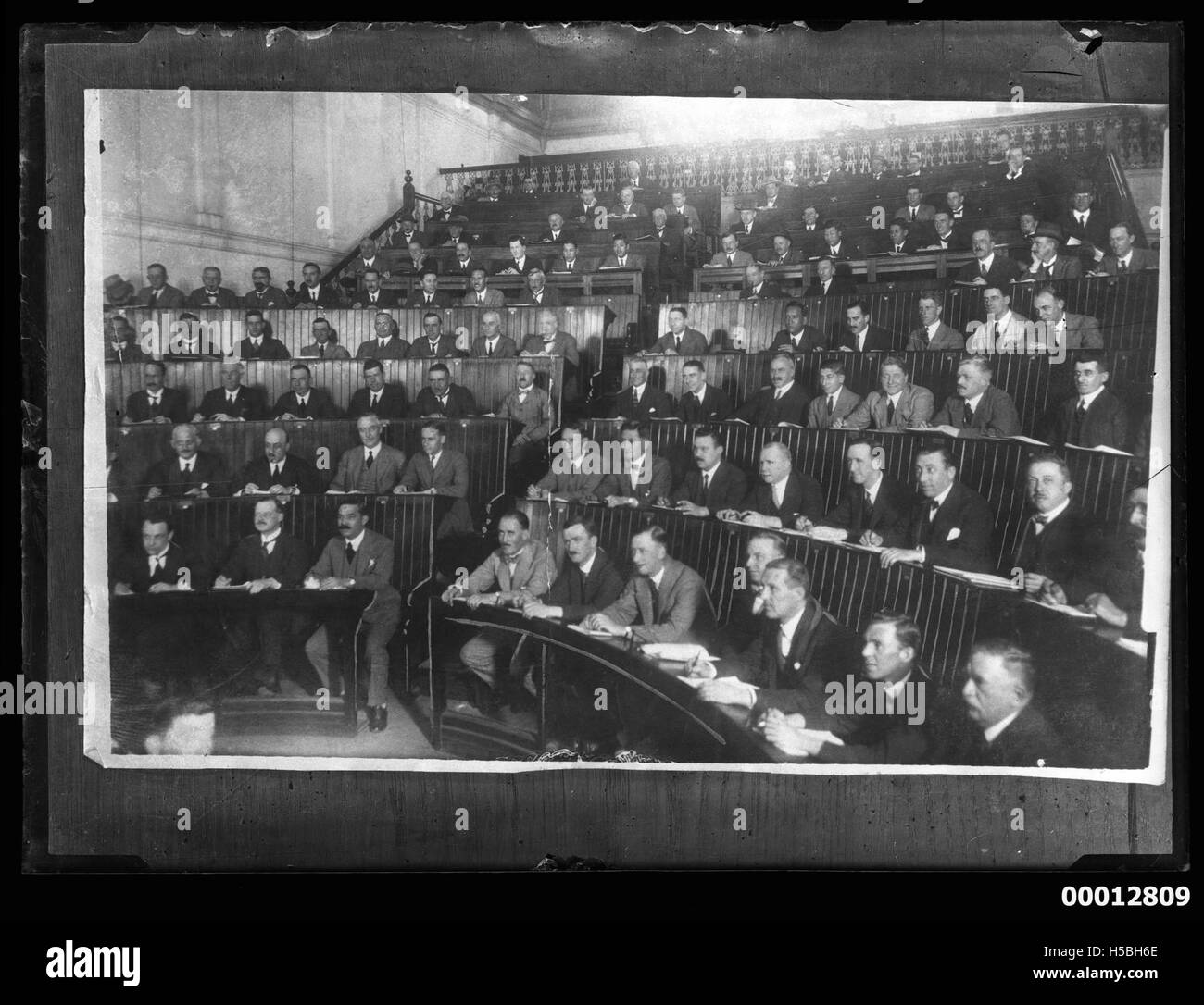Men gathered in the Sale Room of the Royal Exchange Building on Bridge ...