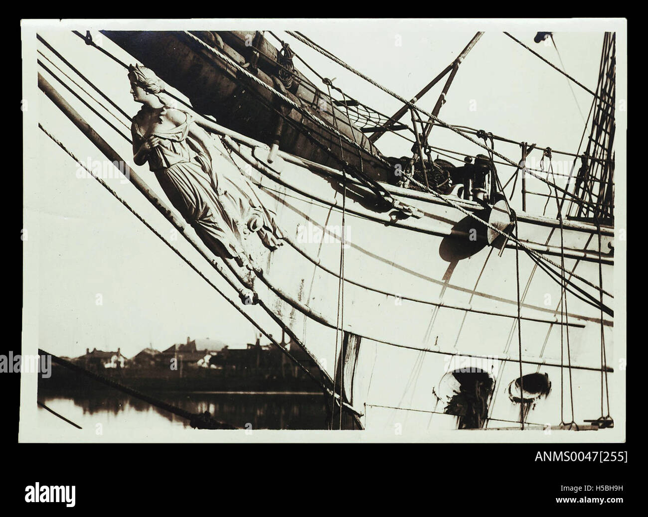 This photograph shows the figurehead of the iron-hulled sailing ship ...