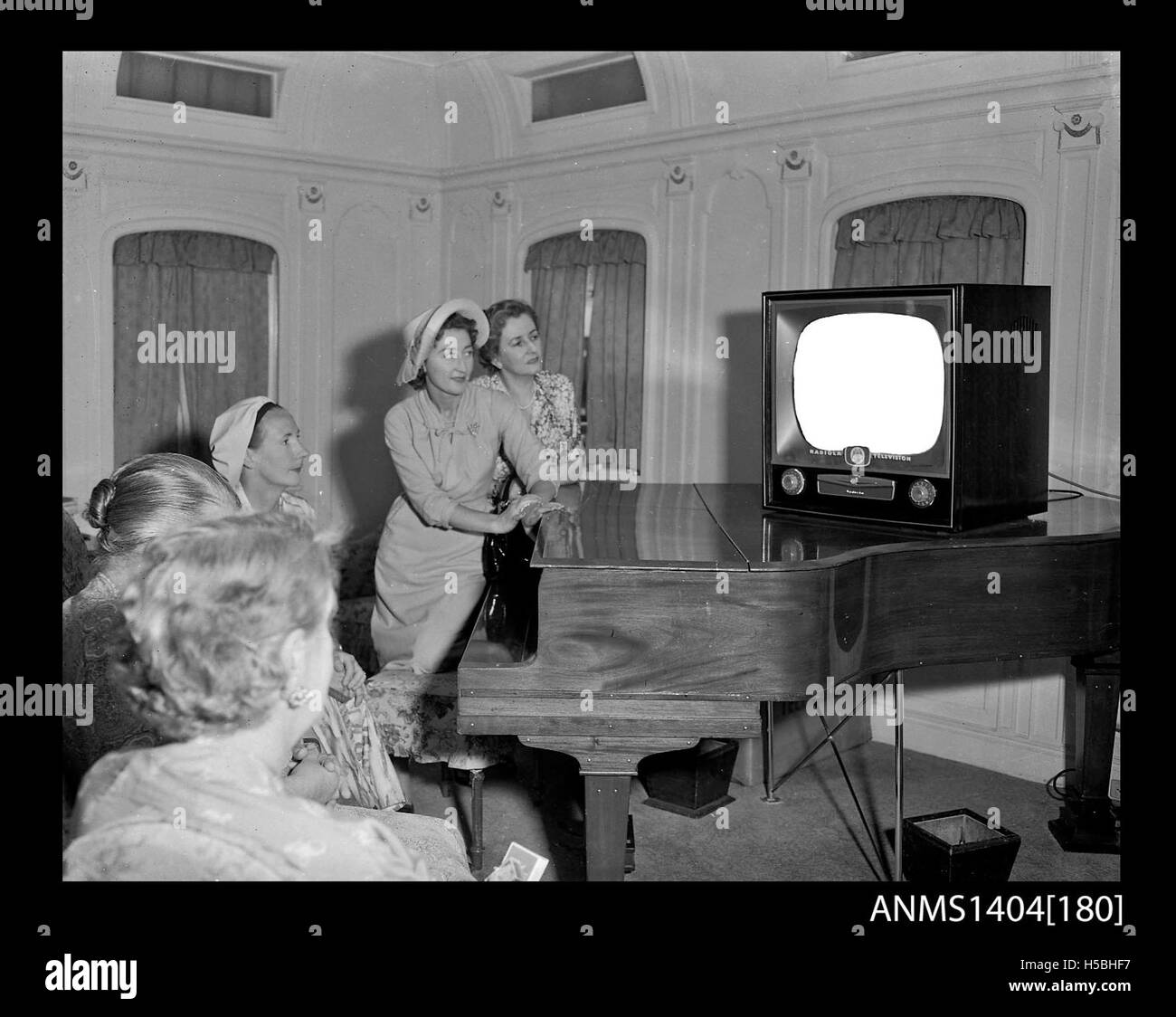 Women watching tv Black and White Stock Photos & Images - Alamy