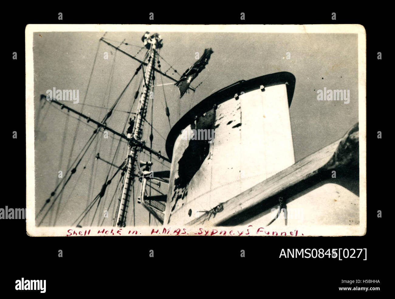 This image shows the damage to the funnel of HMAS SYDNEY (II), a Royal ...