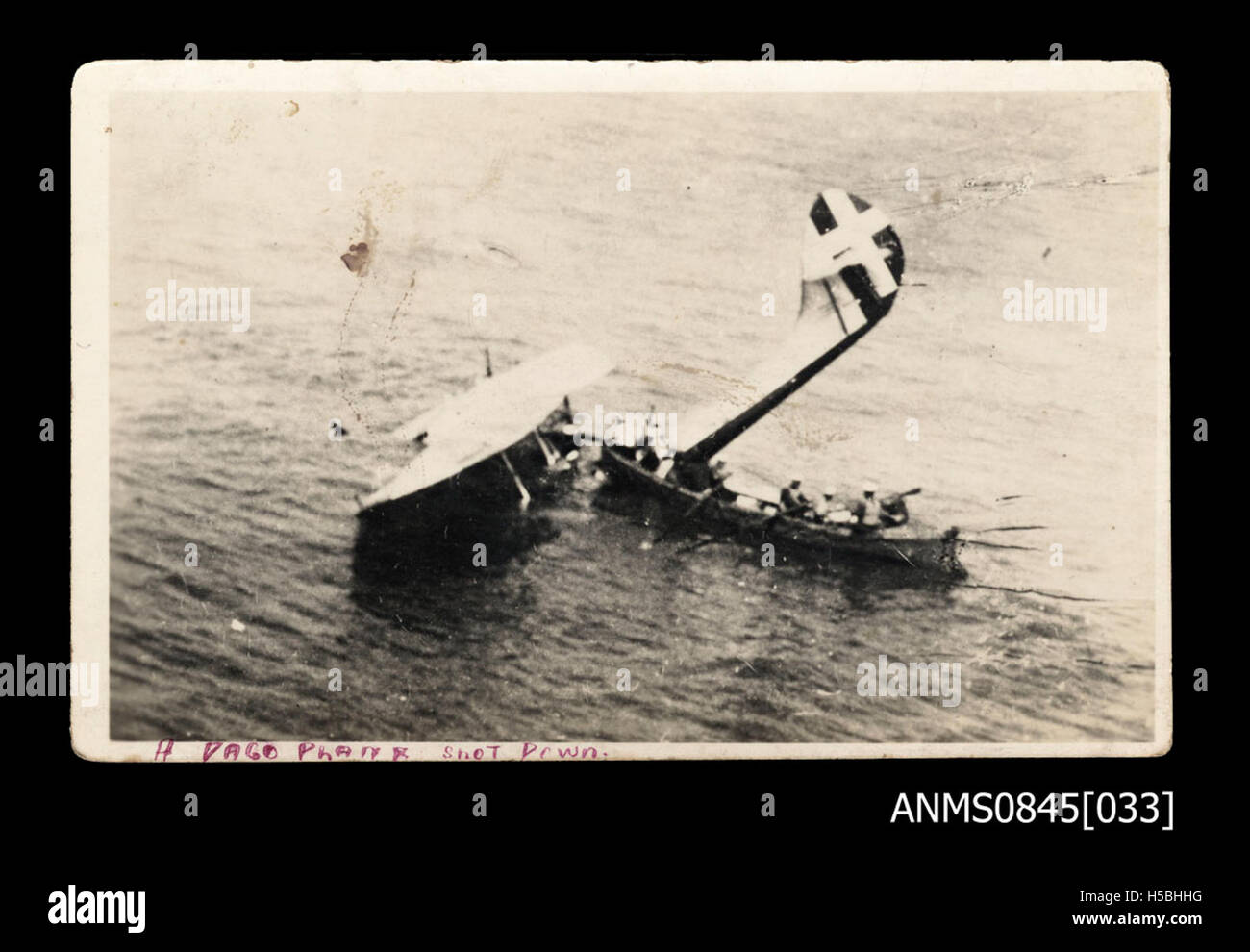 The image depicts an Italian seaplane sinking, accompanied by a ...