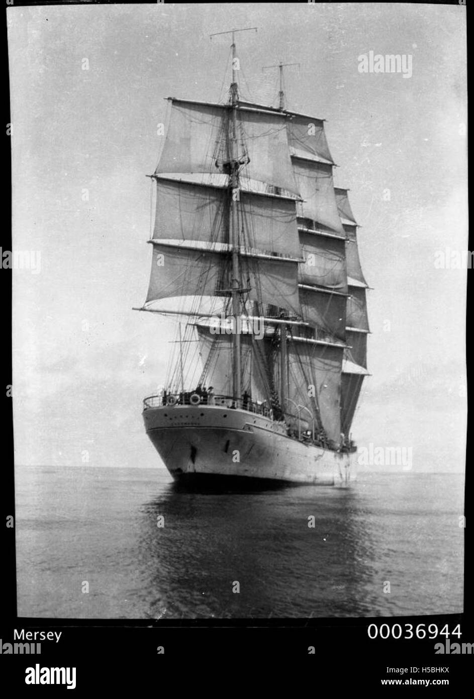 A photograph of the three-masted ship MERSEY sailing at sea, reflecting ...