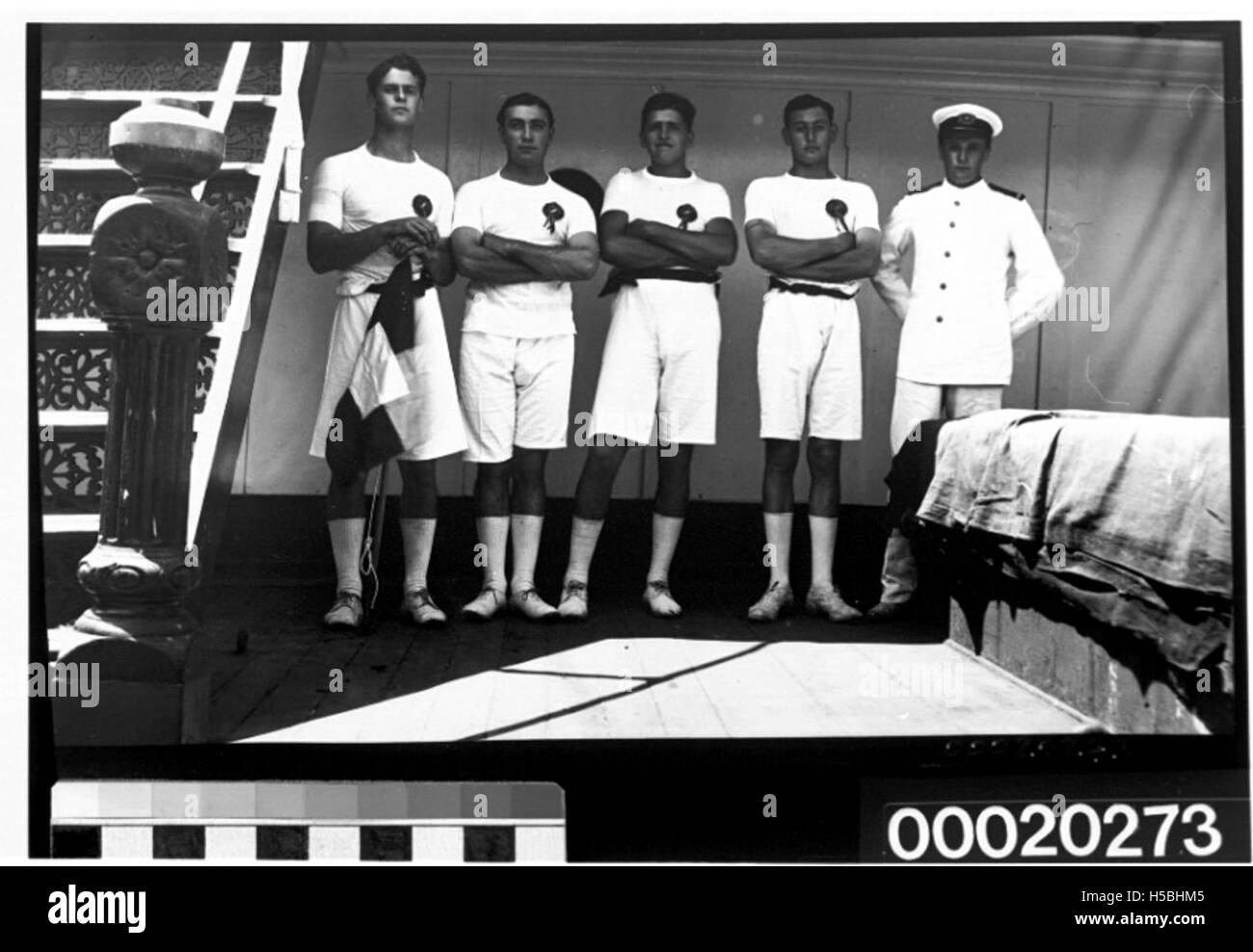 This photograph shows five crew members on board the vessel Mersey ...