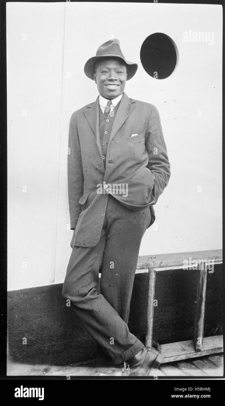 This image depicts six unidentified passengers aboard the SS Suevic, a ...