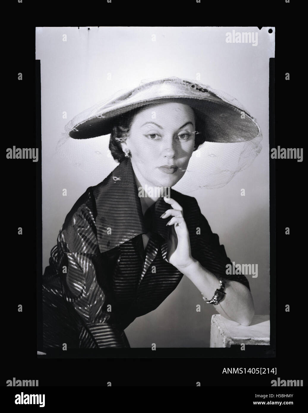 This photograph features a woman modelling streetwear from 1954 ...