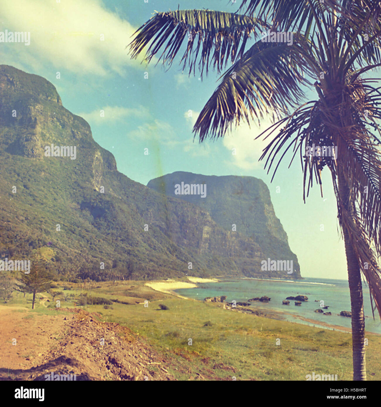 This image presents a view of Mount Gower and Mount Lidgbird, prominent ...