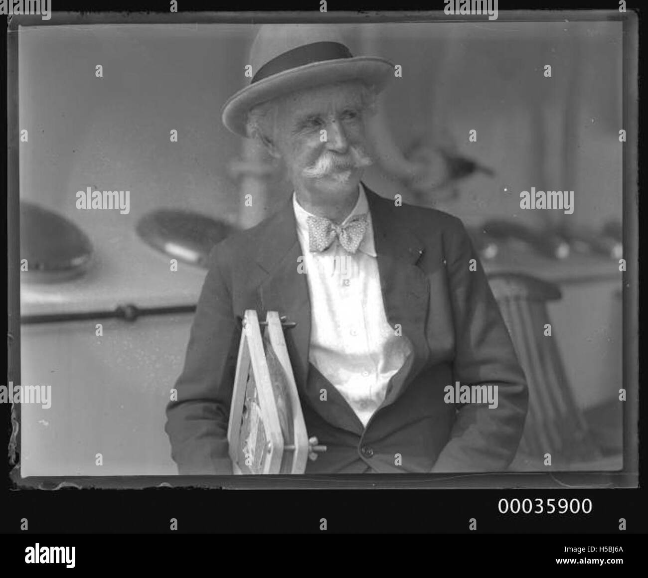 This portrait shows an elderly man with a large mustache aboard the SS ...