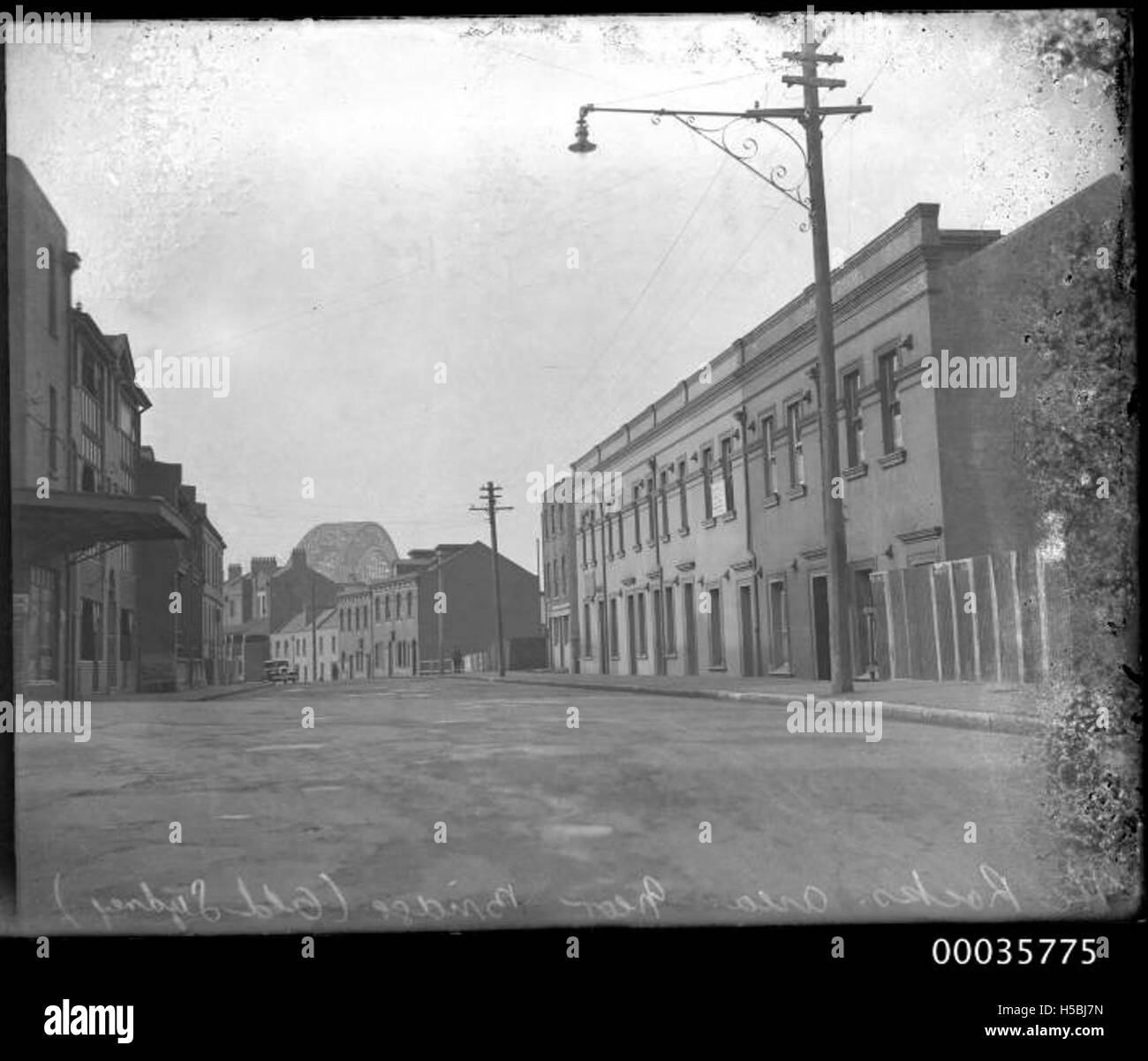 Gloucester Street in The Rocks is shown with the Sydney Harbour Bridge ...