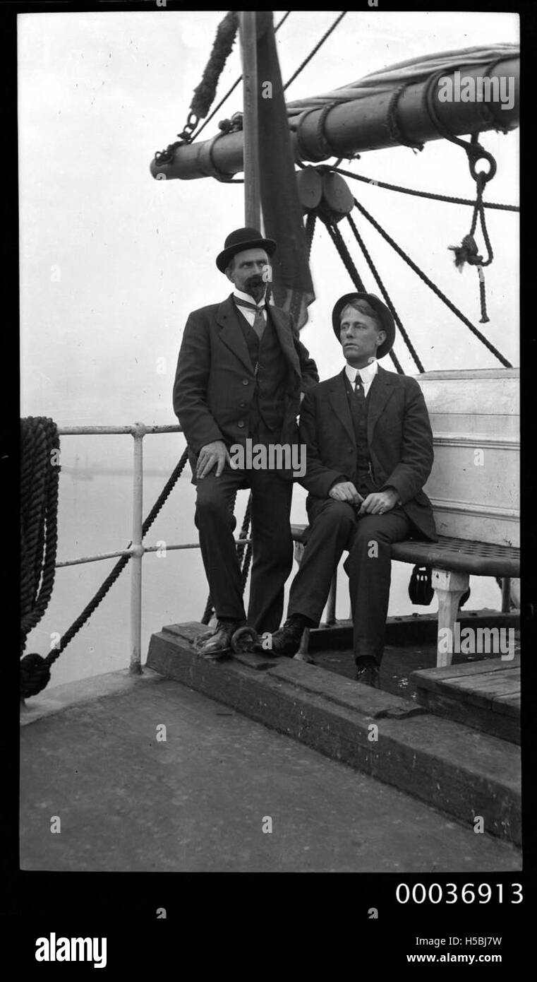 A photograph featuring an unidentified crew member with Captain ...