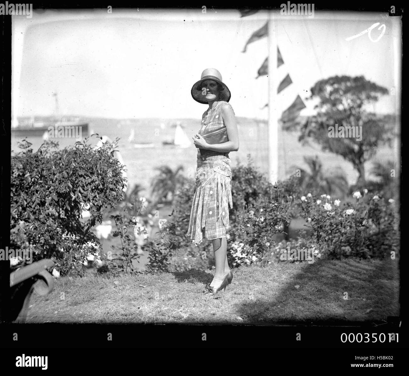 This photograph from the Hood Collection features a woman wearing a ...