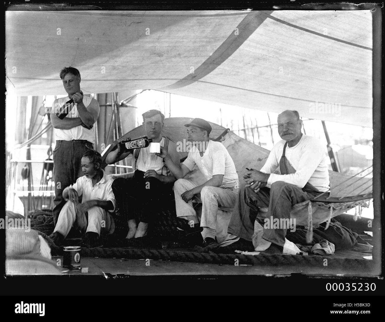 Crew posing on board the four-masted steel barque JOHN ENA Stock Photo ...