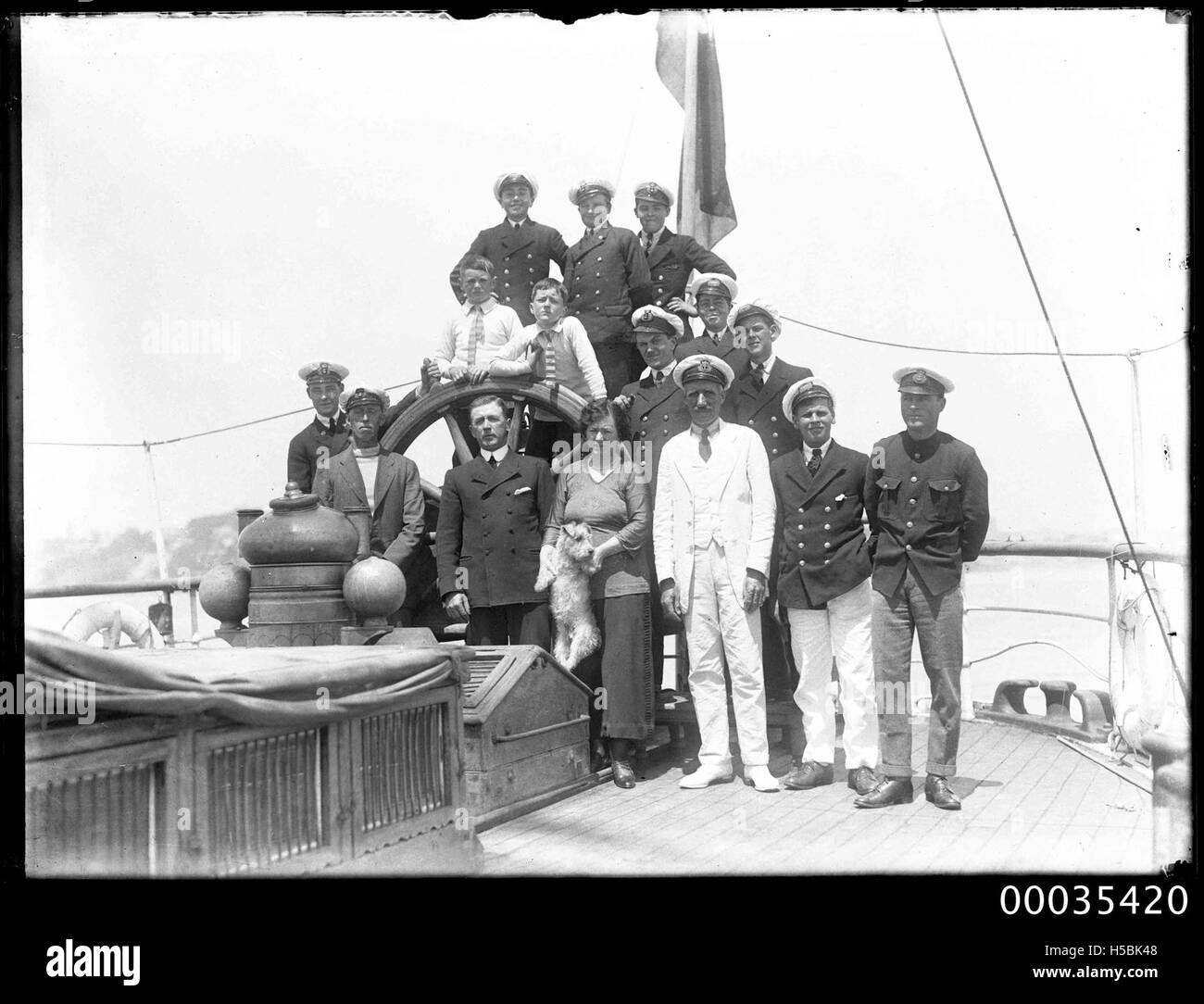 This photograph shows the crew of the British naval vessel MOUNT ...