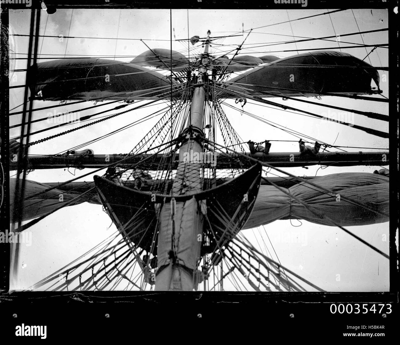 A photograph taken from below the mast of a ship, capturing a view ...