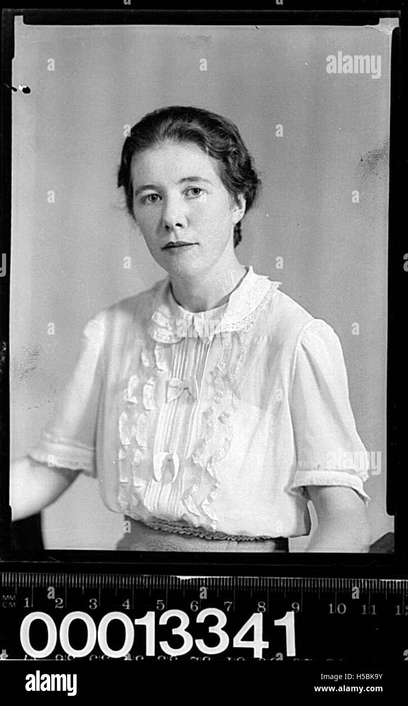 This portrait features a woman, capturing her likeness in a specific ...