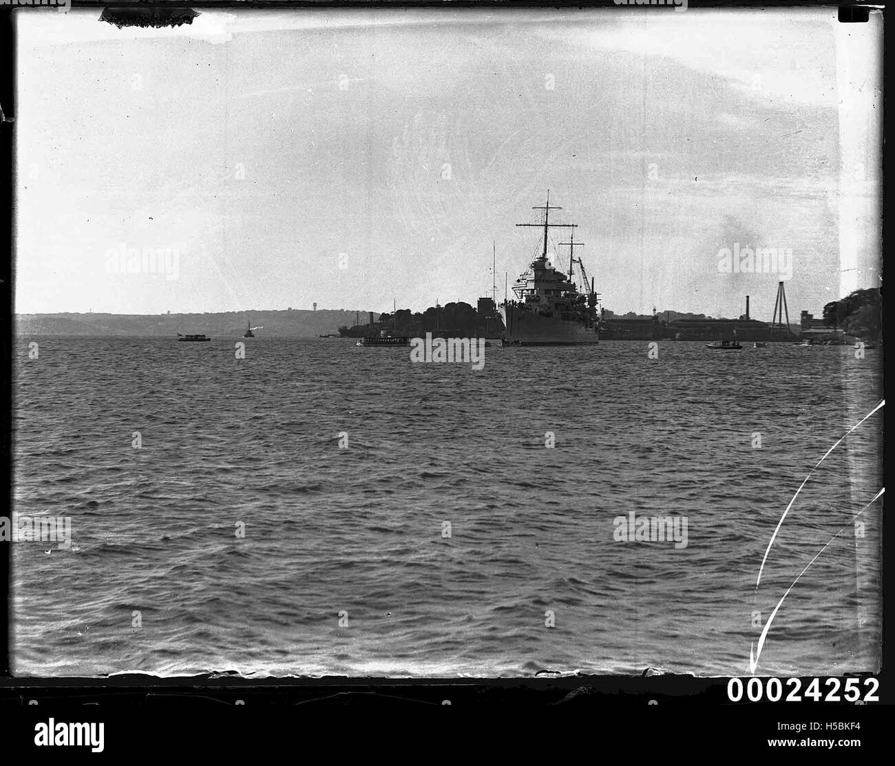 The USS Astoria, an American cruiser, is anchored in Farm Cove, Sydney ...