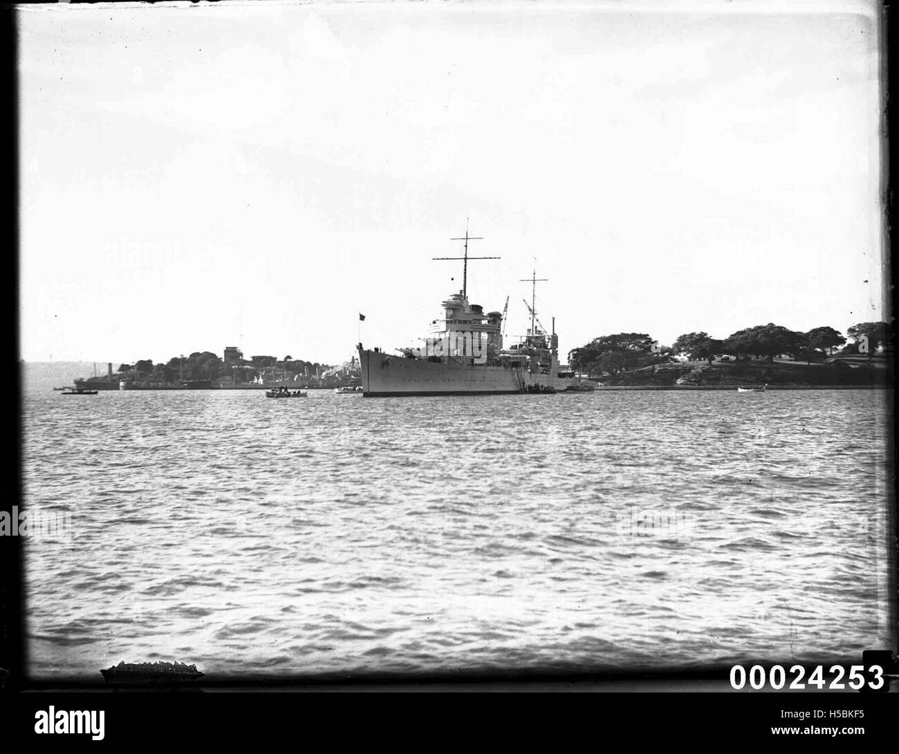 The USS Astoria, an American cruiser, is anchored in Farm Cove, Sydney ...