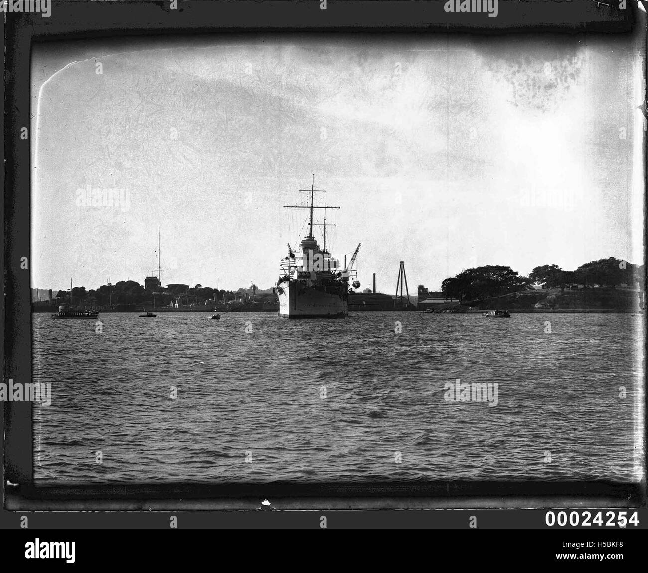 This photograph shows the USS Astoria anchored in Farm Cove, Sydney, in ...
