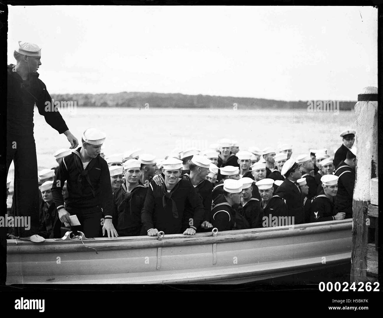 A group of naval sailors from the USS Astoria, photographed in August ...