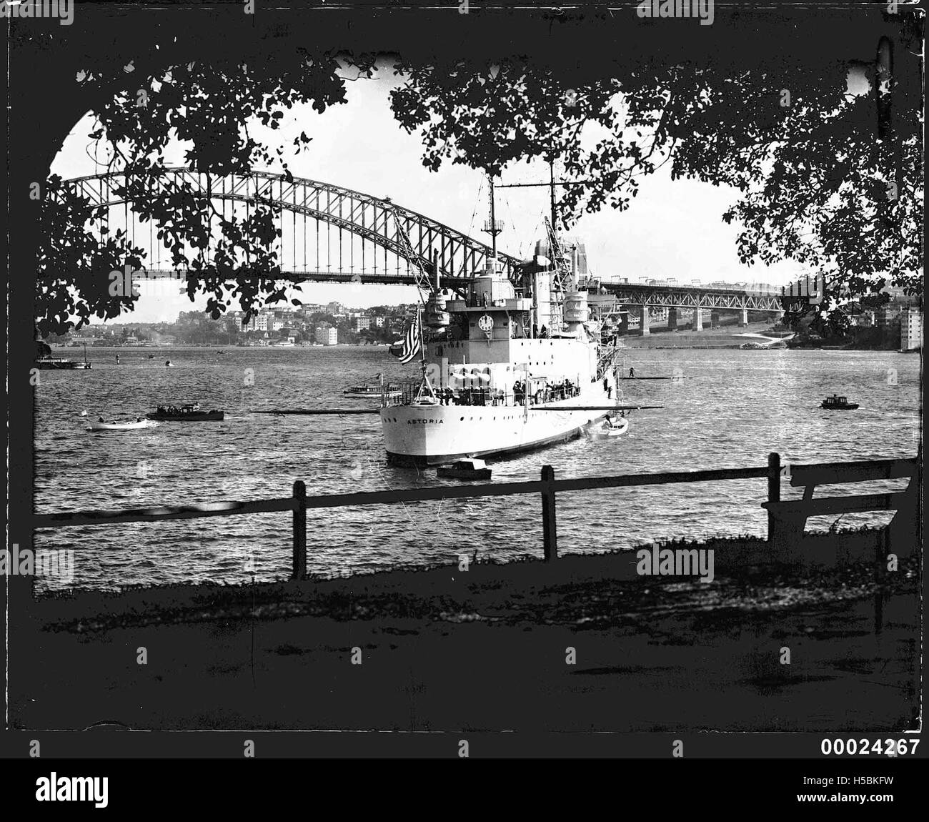 The USS Astoria, an American cruiser, is seen in Farm Cove, Sydney, in ...