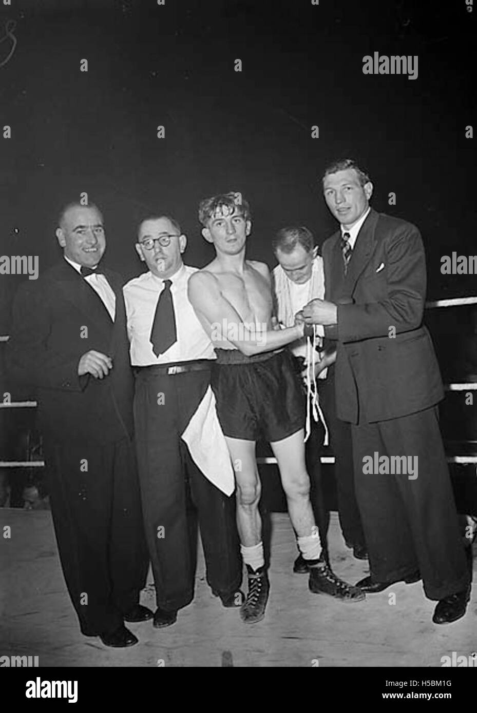 This photograph captures a historic boxing match between The Cliff ...